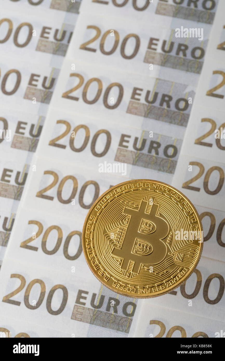 Gold Bitcoin on 200 Euro banknote. For European Digital Single Market ...