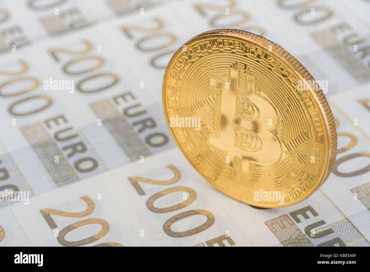 Gold Bitcoin on 200 Euro banknote. For European Digital Single Market ...