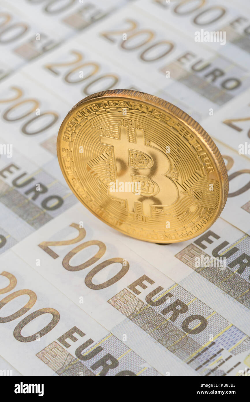 Gold Bitcoin on 200 Euro banknote. For European Digital Single Market ...