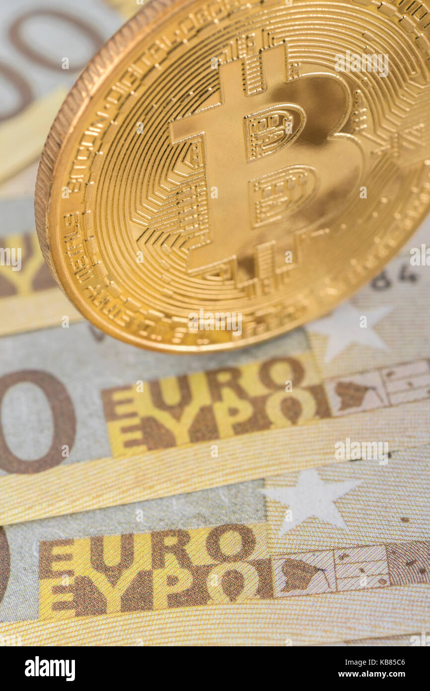 Gold Bitcoin on 200 Euro banknote. For European Digital Single Market ...