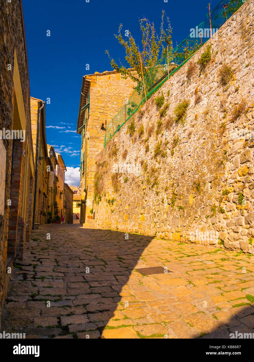 The colorful stone buildings in an historic village in Tuscany Stock ...