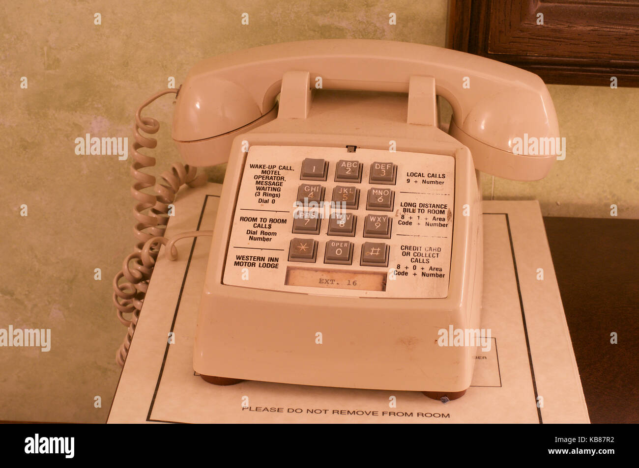 Classic telephone in a motel bedroom Stock Photo - Alamy