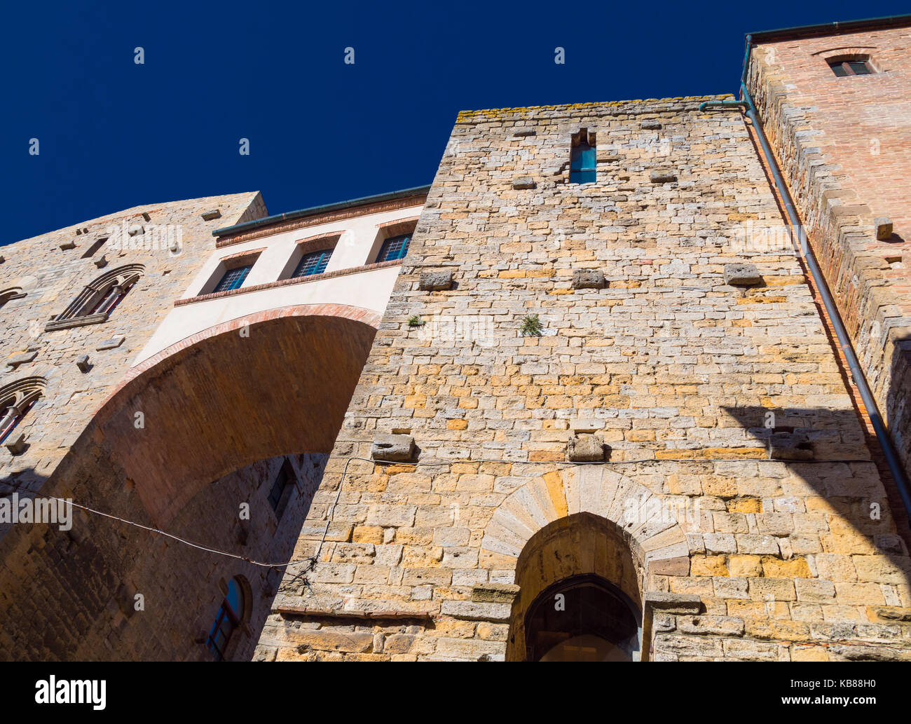 Amazing stone buildings in the historic district of Volterra - VOLTERRA ...