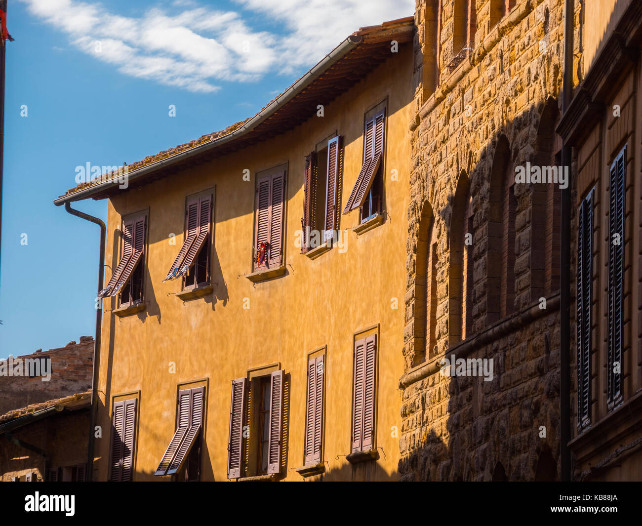 Beautiful ancient buildings in the city center of Volterra - a small ...