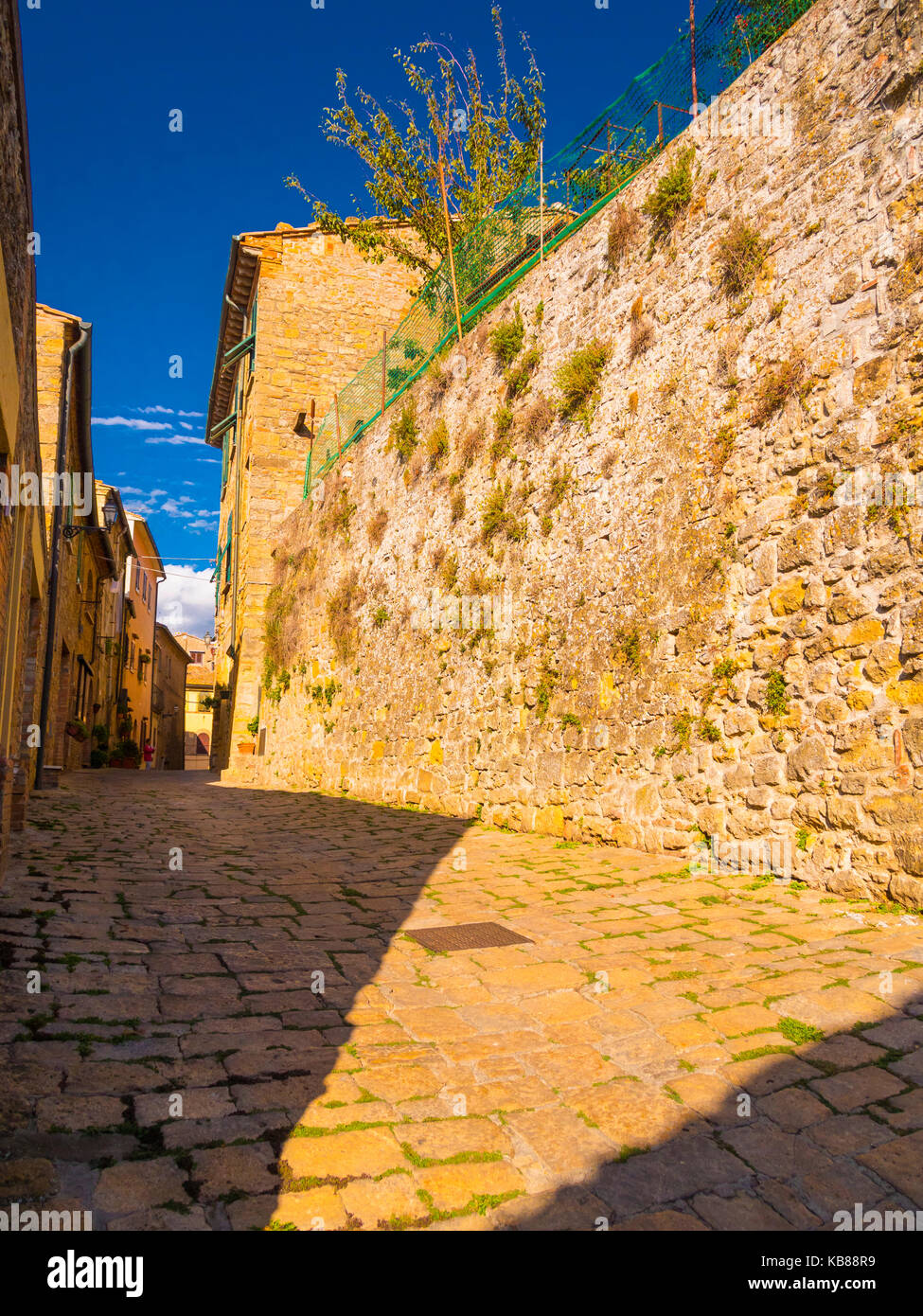 Beautiful ancient stone buildings in the heart of Volterra - a small ...