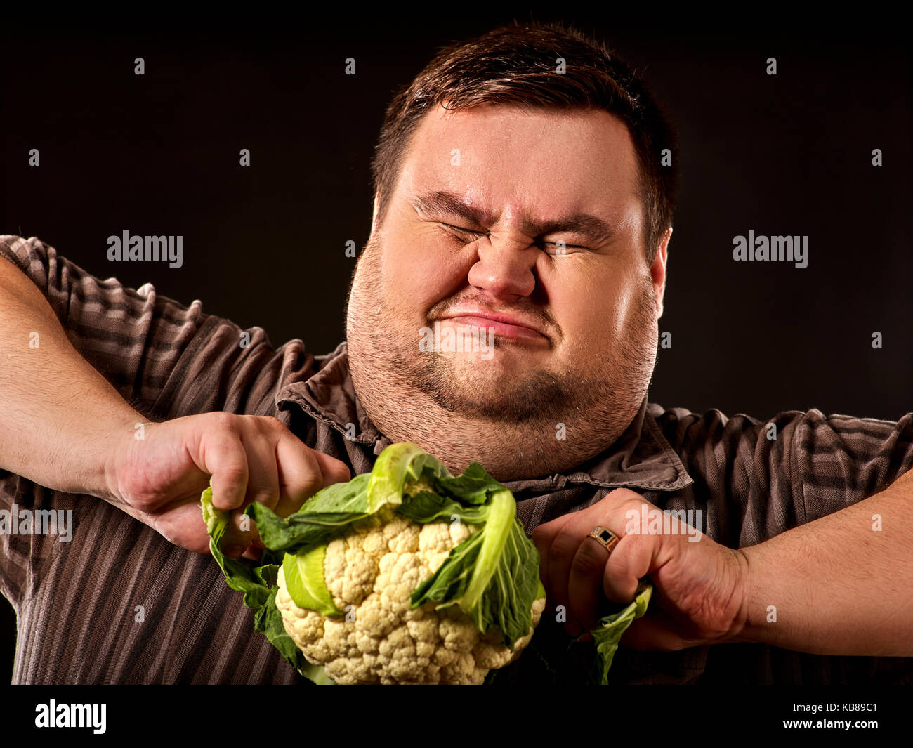 Diet fat man eating healthy food. Healthy breakfast vegetables ...