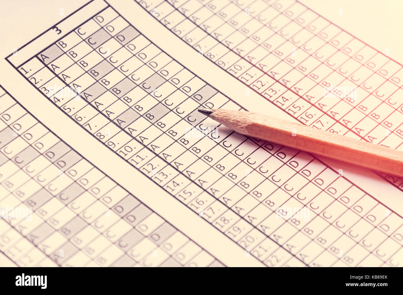 Form for the exam with the pencil lying on it. Testing. Selective focus ...