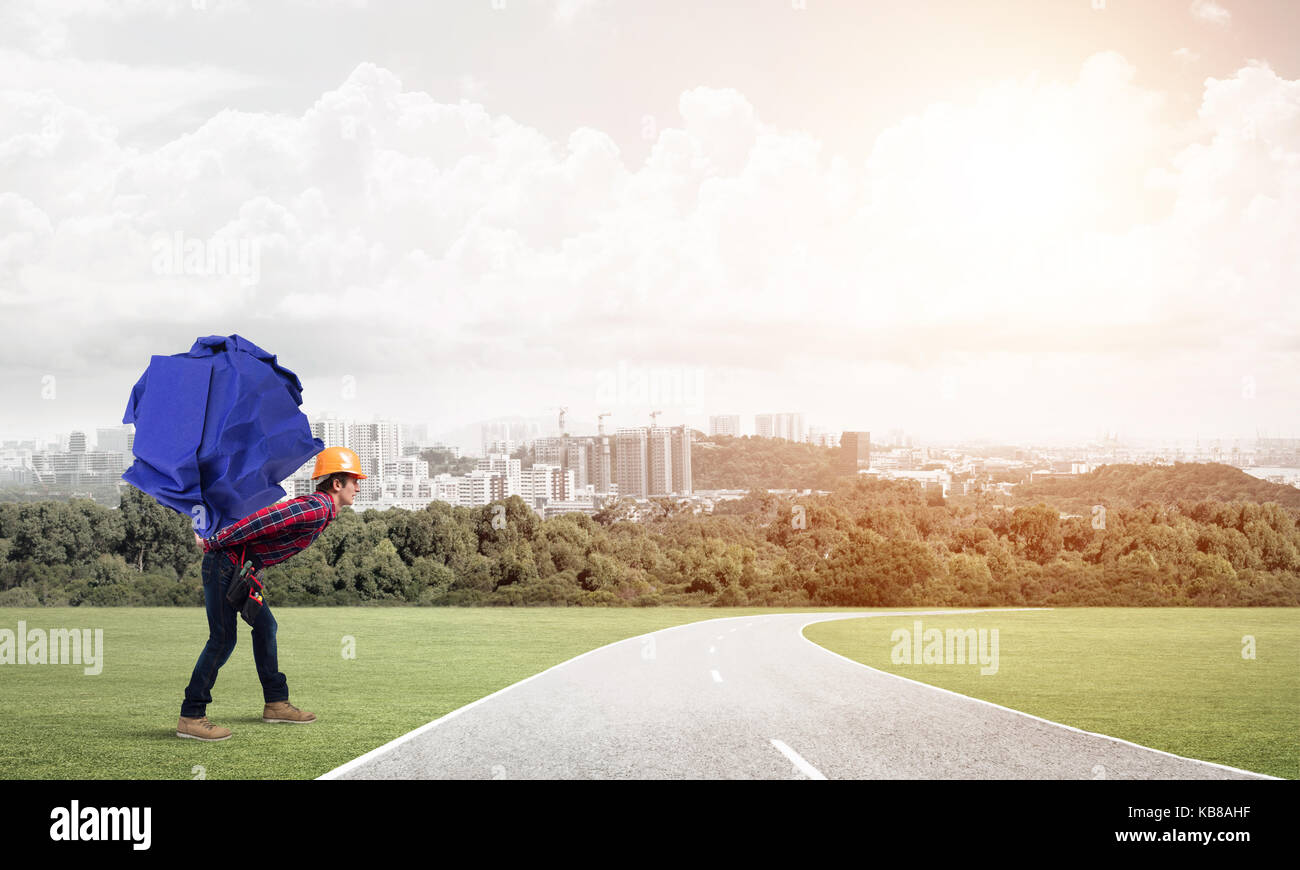 Engineer man carry load Stock Photo - Alamy