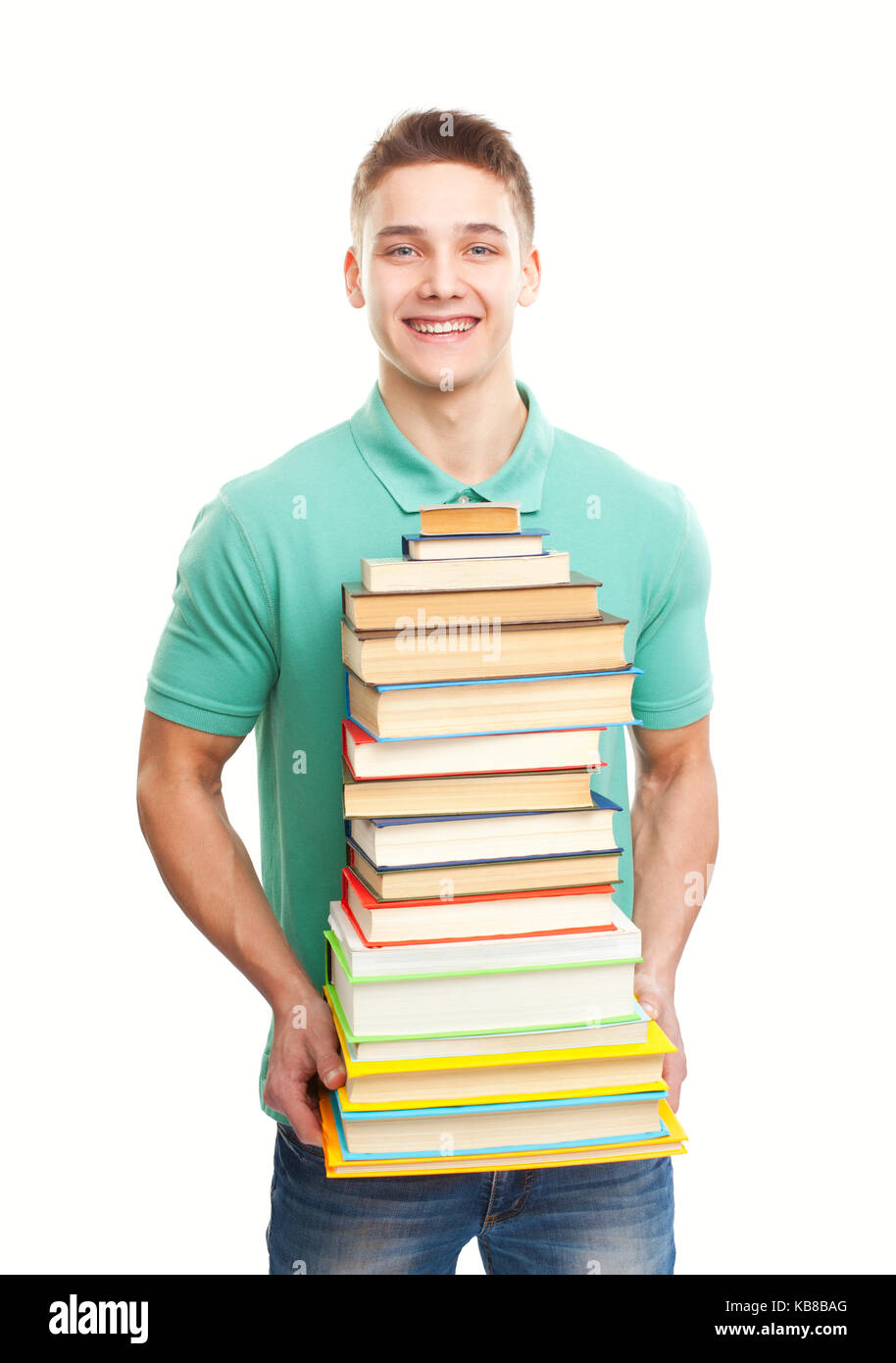 Portrait of happy smiling student holding big stack of books isolated ...