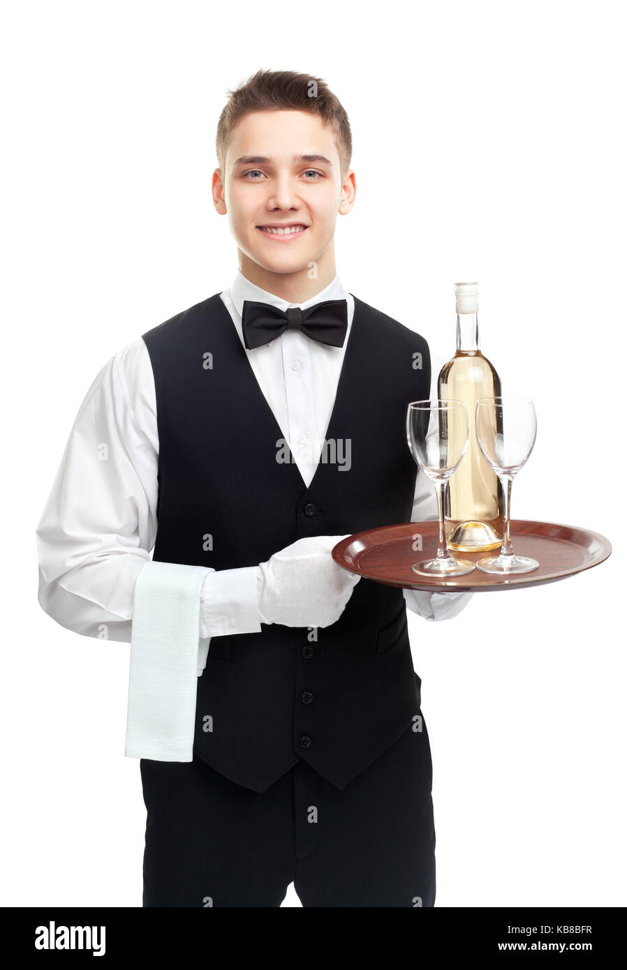 Portrait of young happy smiling waiter with bottle of white wine and ...
