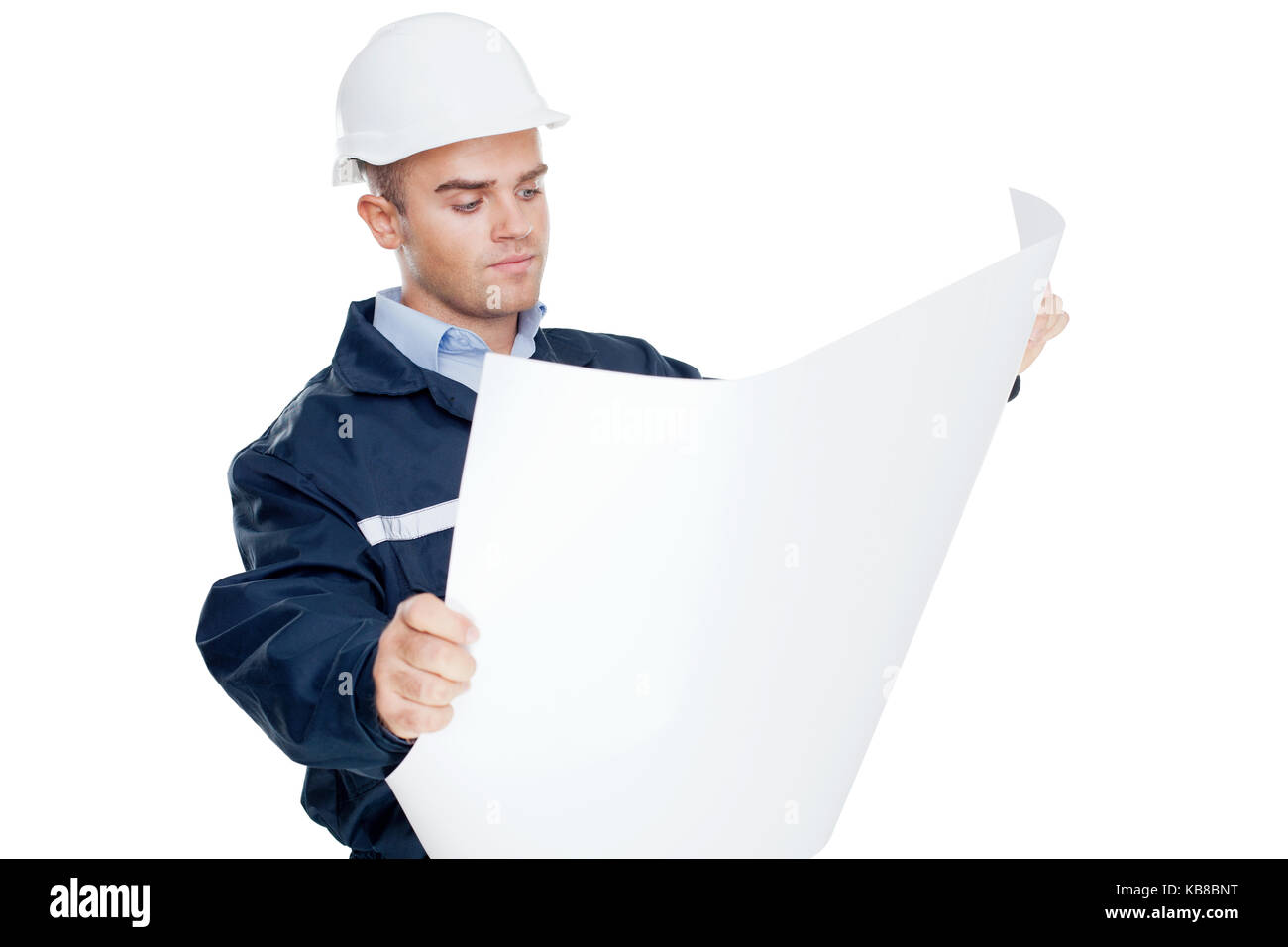 Young engineer looking at blueprint isolated on white background Stock ...
