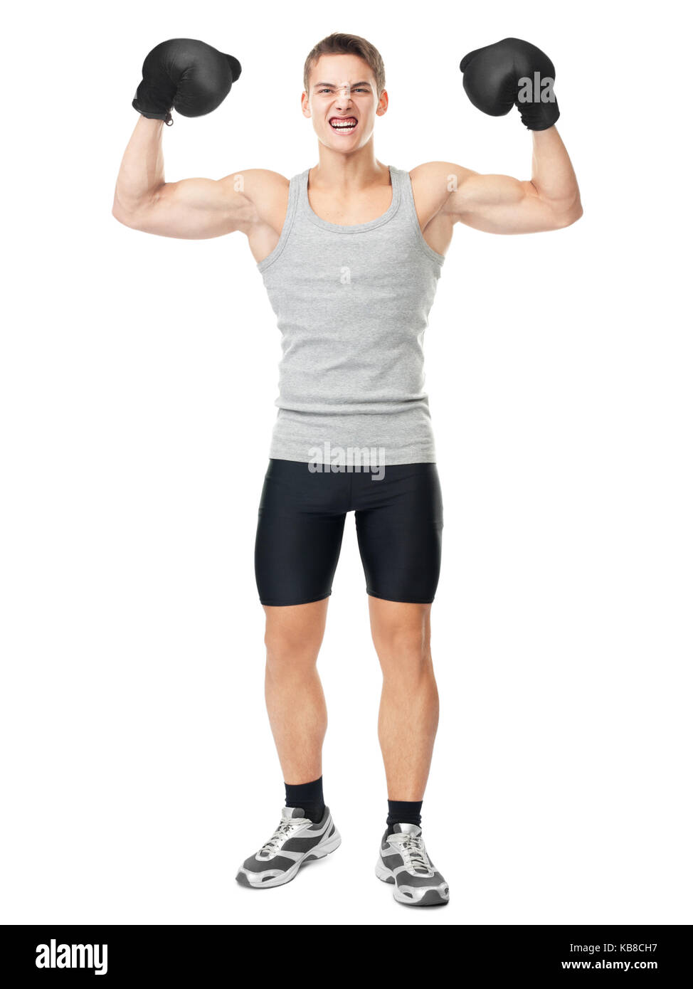 Full length portrait of angry fighter showing biceps isolated on white ...