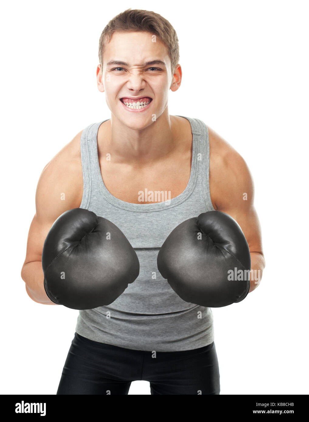 Portrait of angry young boxer with a grin isolated on white background ...
