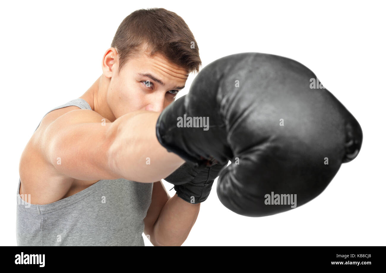 Portrait of young boxer making punch isolated on white background Stock ...