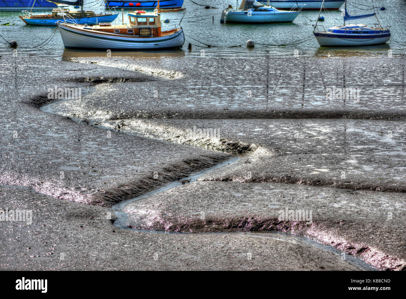 Drainage channels in the estuary mud at low tide. (Processed as an HDR ...