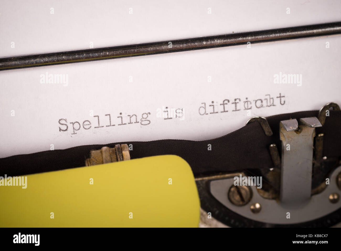 Old typewriter with text that contains spelling mistakes, a concept ...