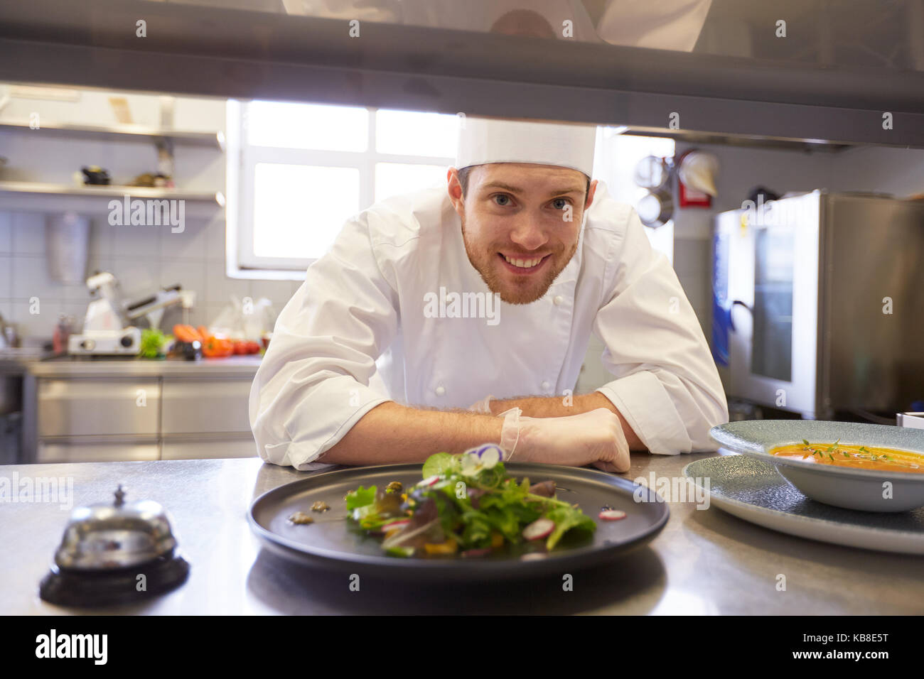 happy male chef cooking food at restaurant kitchen Stock Photo - Alamy