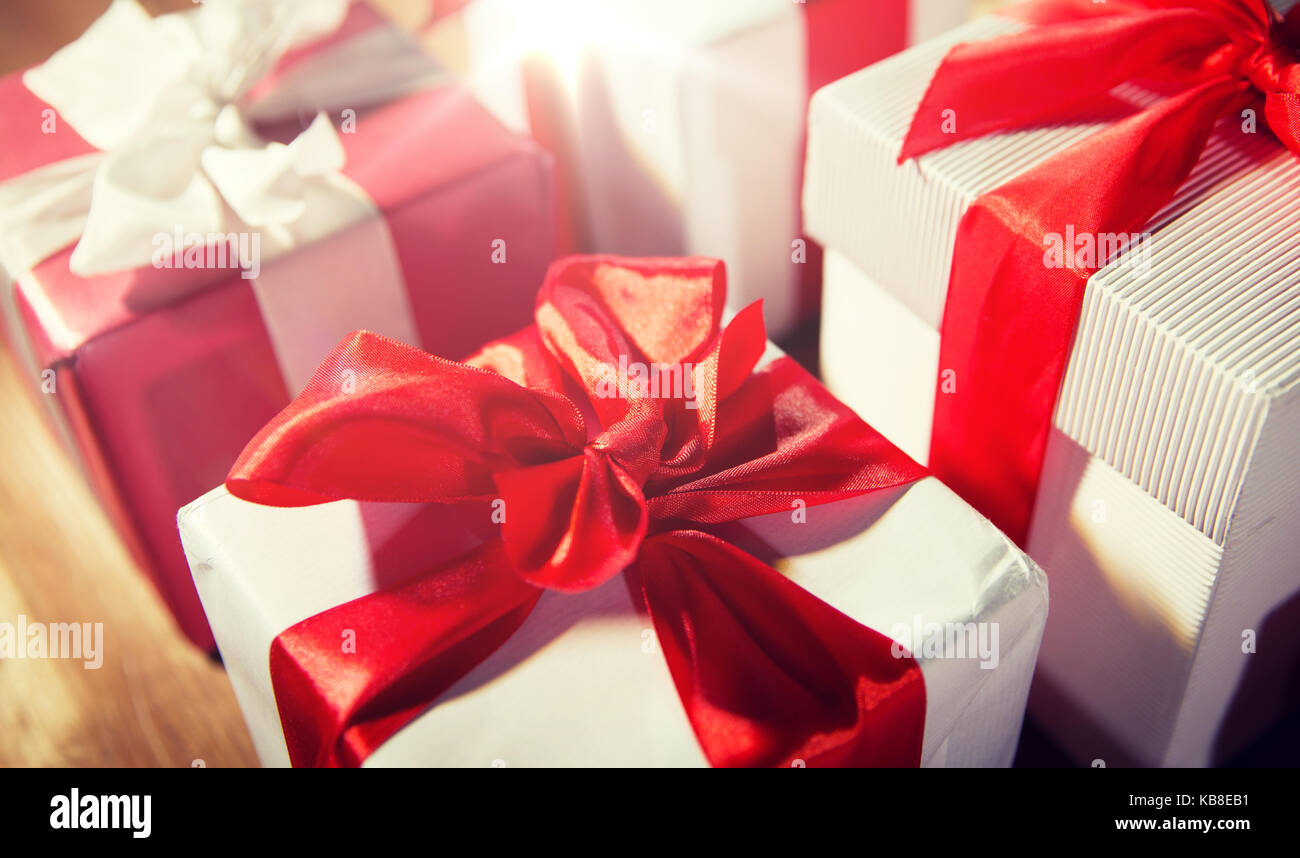 close up of gift boxes on wooden floor Stock Photo - Alamy