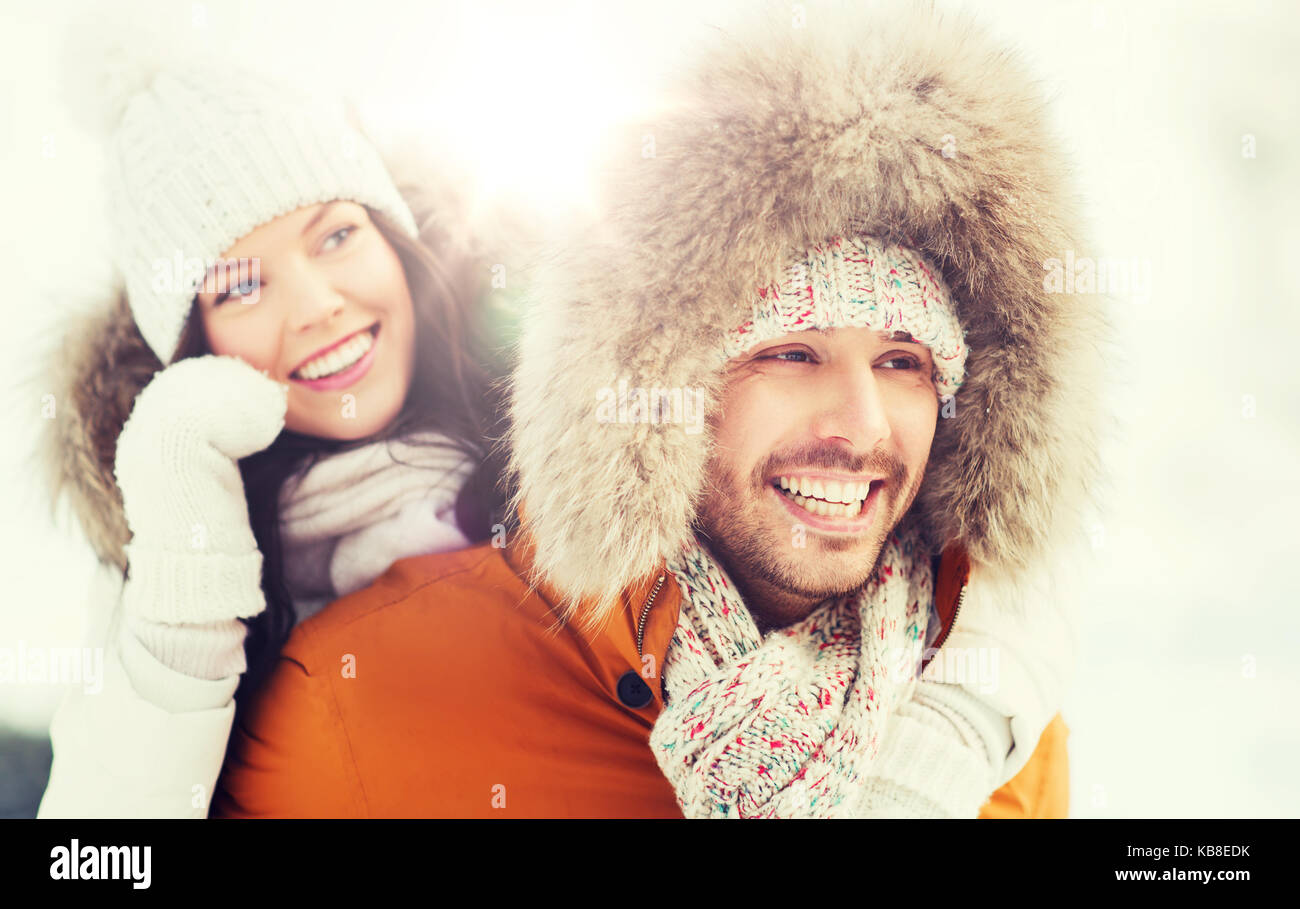 happy couple having fun over winter background Stock Photo - Alamy
