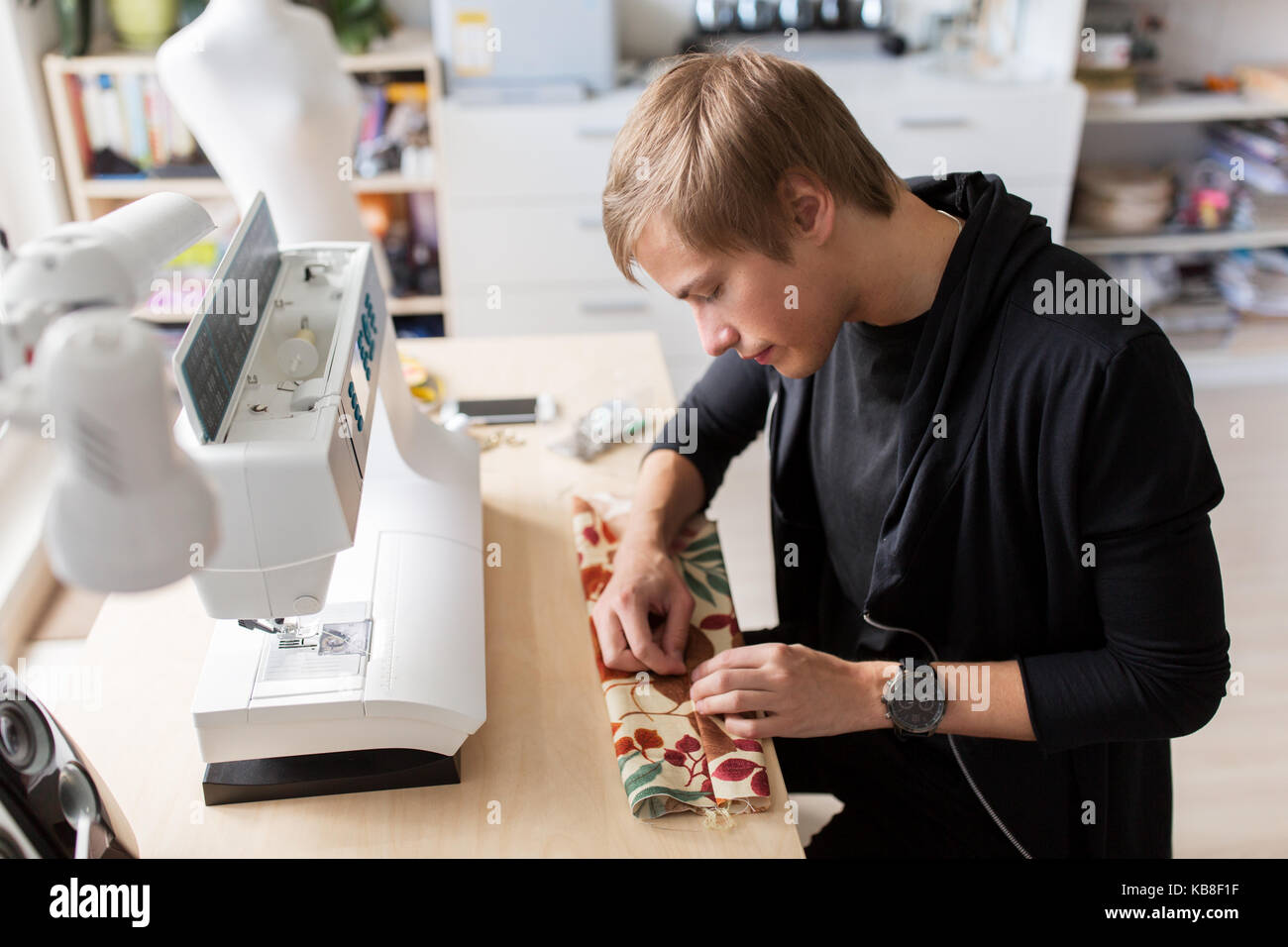 fashion designer with making dress at studio Stock Photo - Alamy