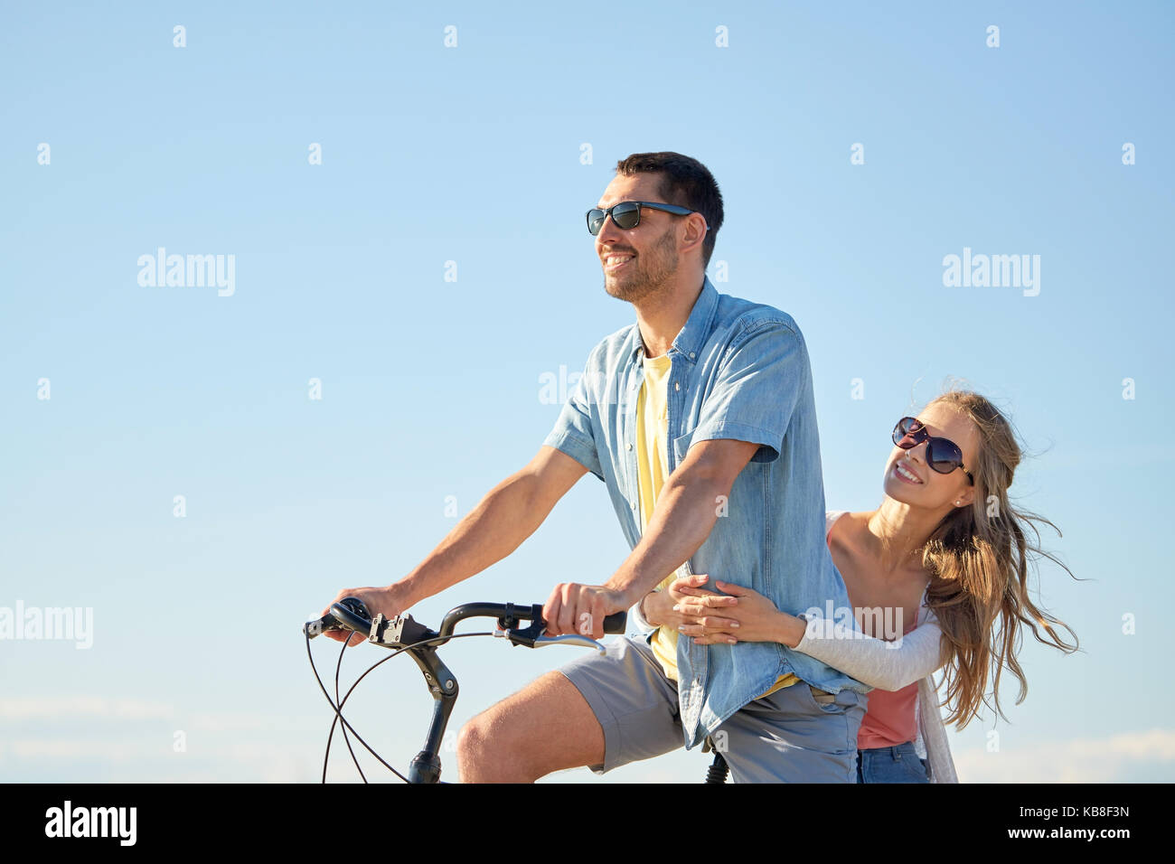 Couple man woman riding bicycle hi-res stock photography and images - Alamy