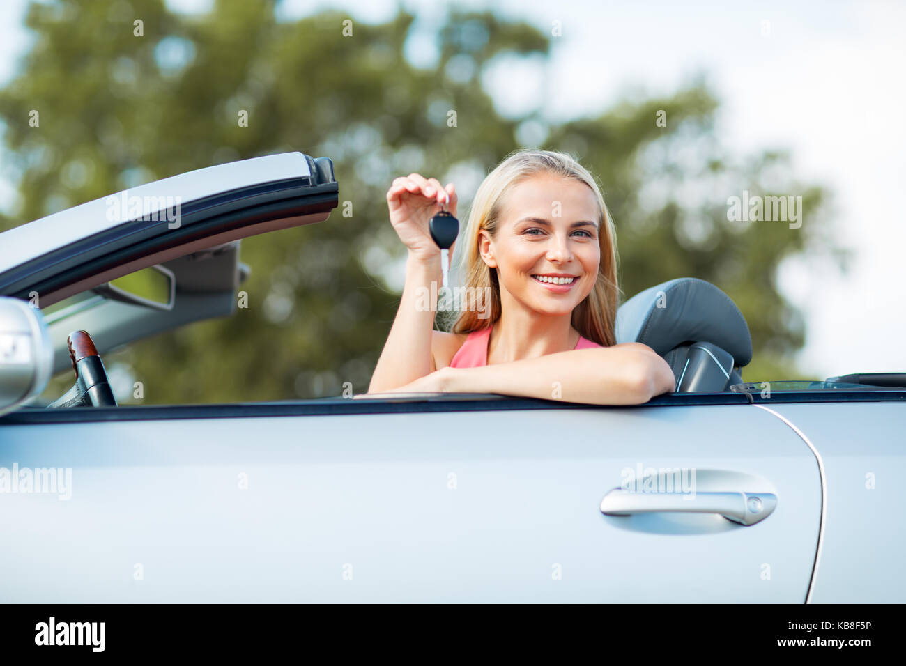 Attractive woman driving convertible car hi-res stock photography and ...