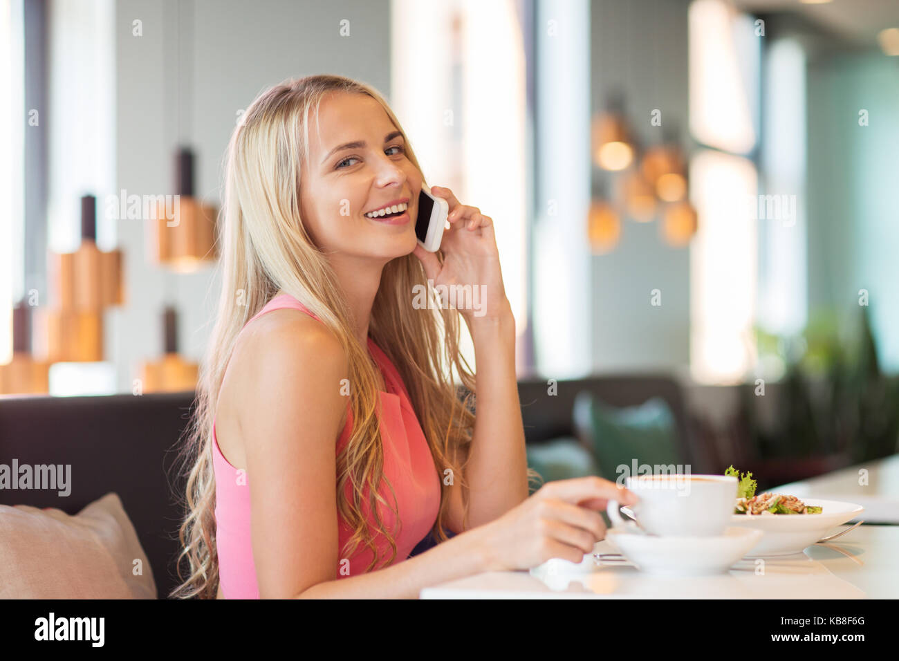 Woman smiling calling customer hi-res stock photography and images - Alamy