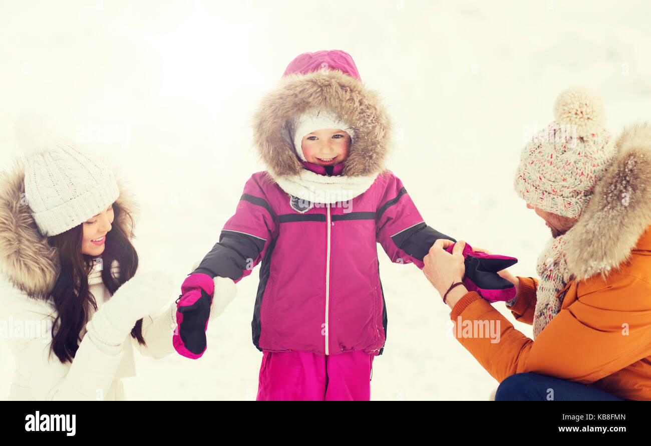 happy family with child in winter clothes outdoors Stock Photo - Alamy