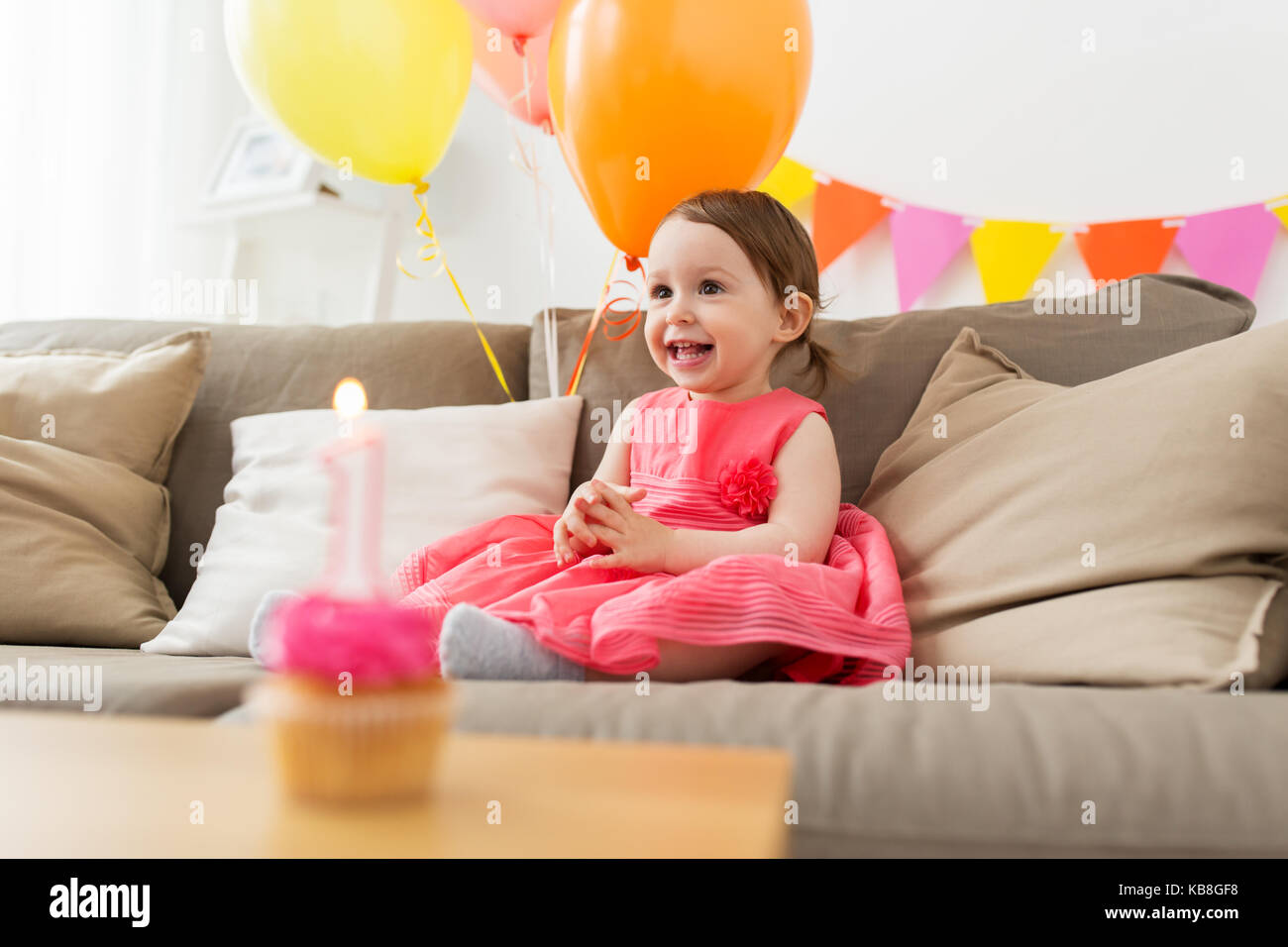 happy baby girl on birthday party at home Stock Photo - Alamy