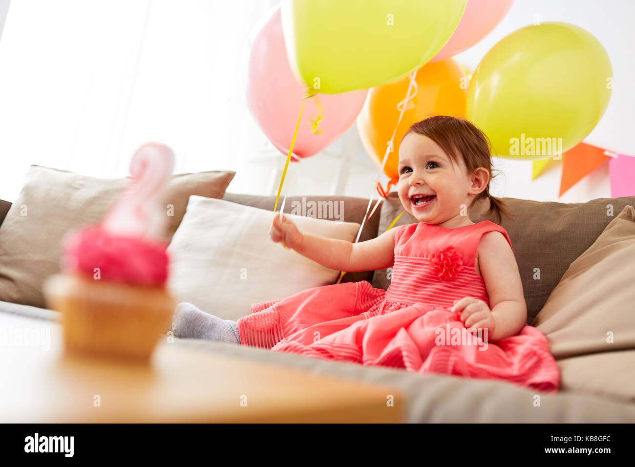 happy baby girl on birthday party at home Stock Photo - Alamy