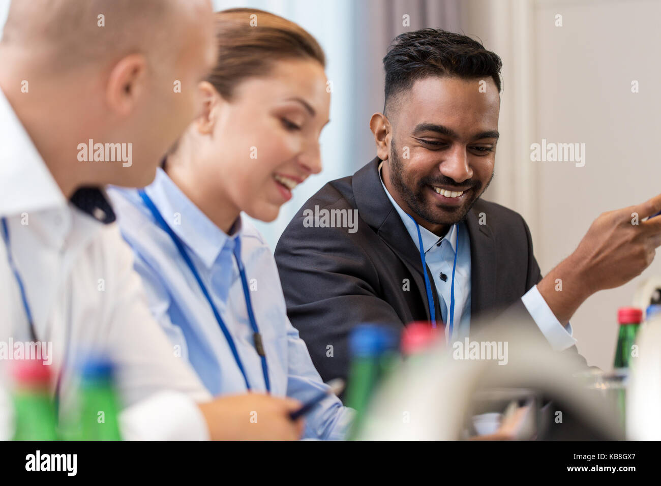 happy business team at international conference Stock Photo - Alamy