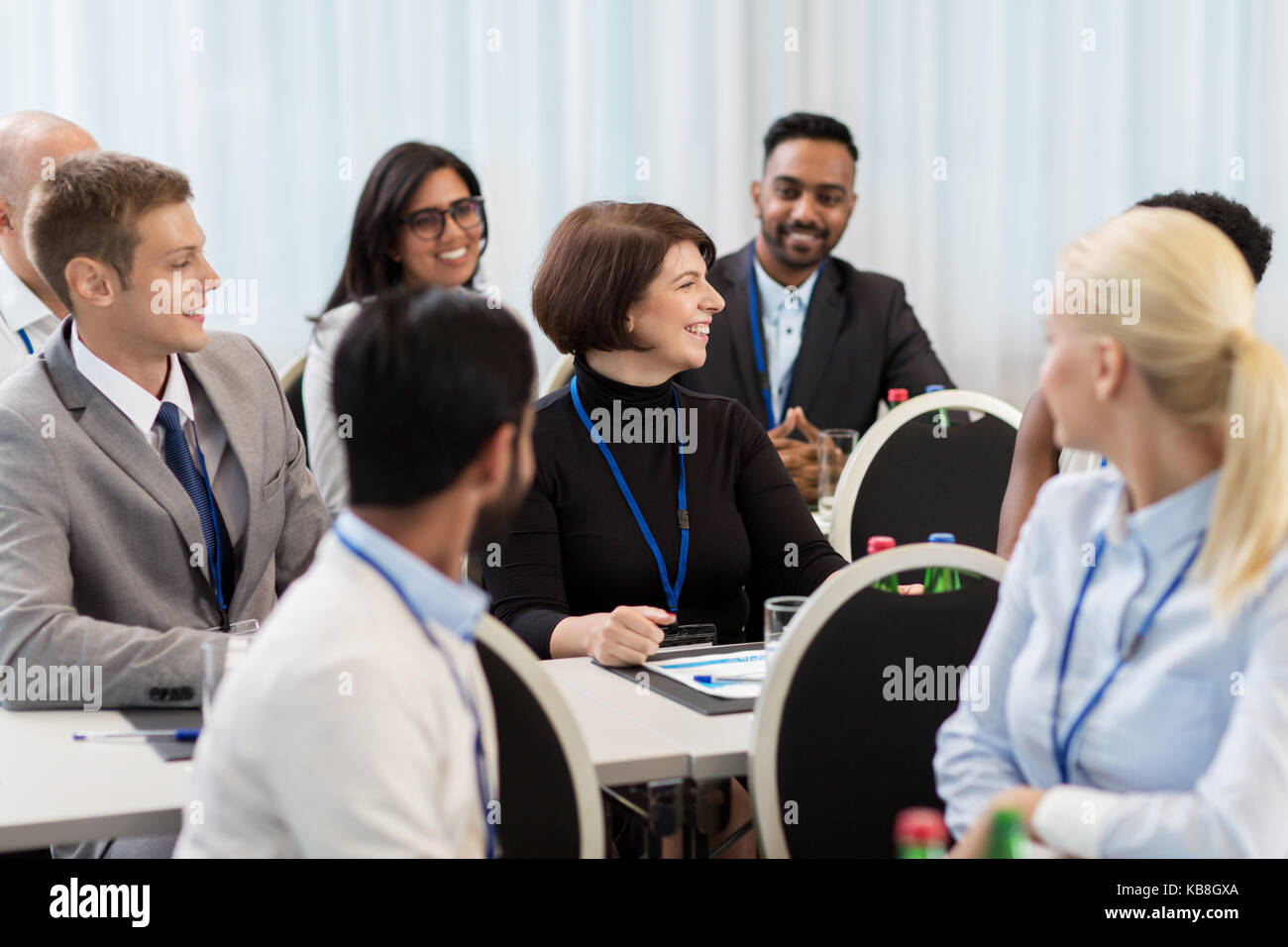 happy business team at international conference Stock Photo - Alamy