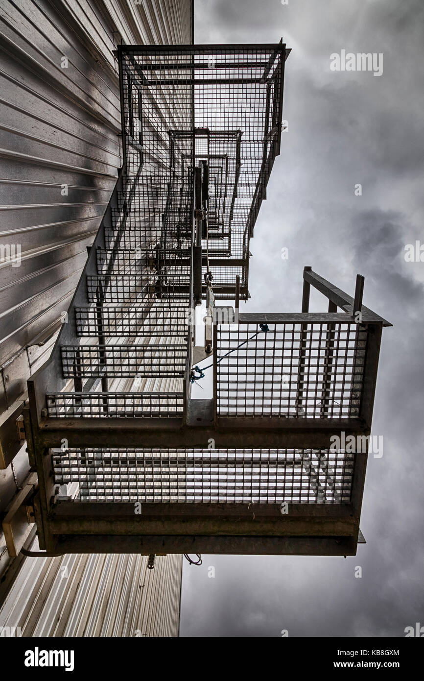 Metal grid staircase from below Stock Photo - Alamy