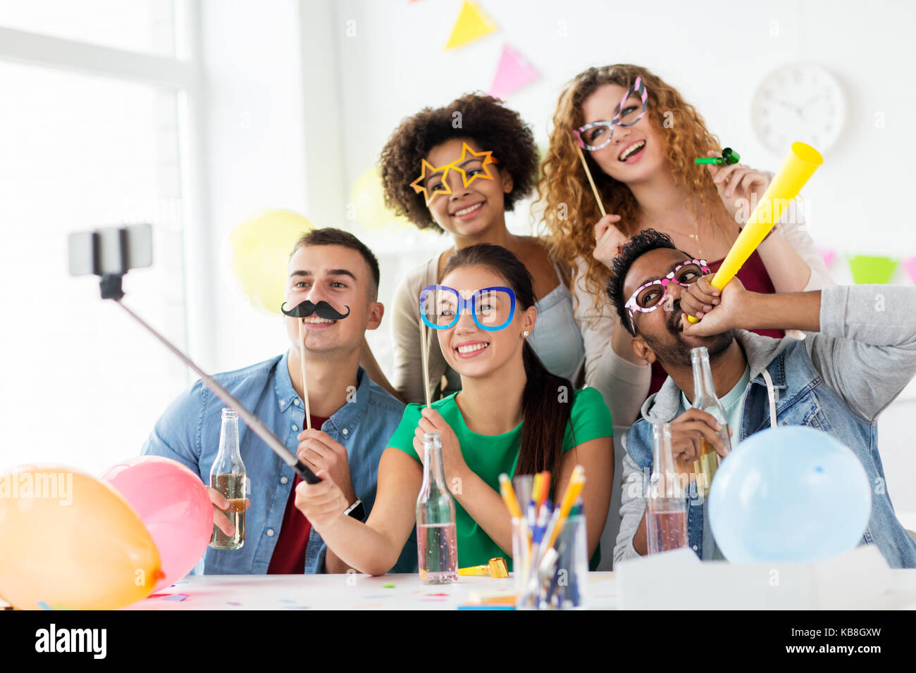 happy team taking selfie at office party Stock Photo - Alamy