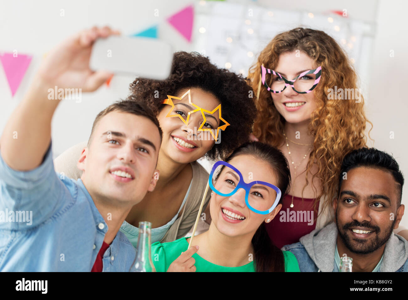 happy team taking selfie at office party Stock Photo - Alamy