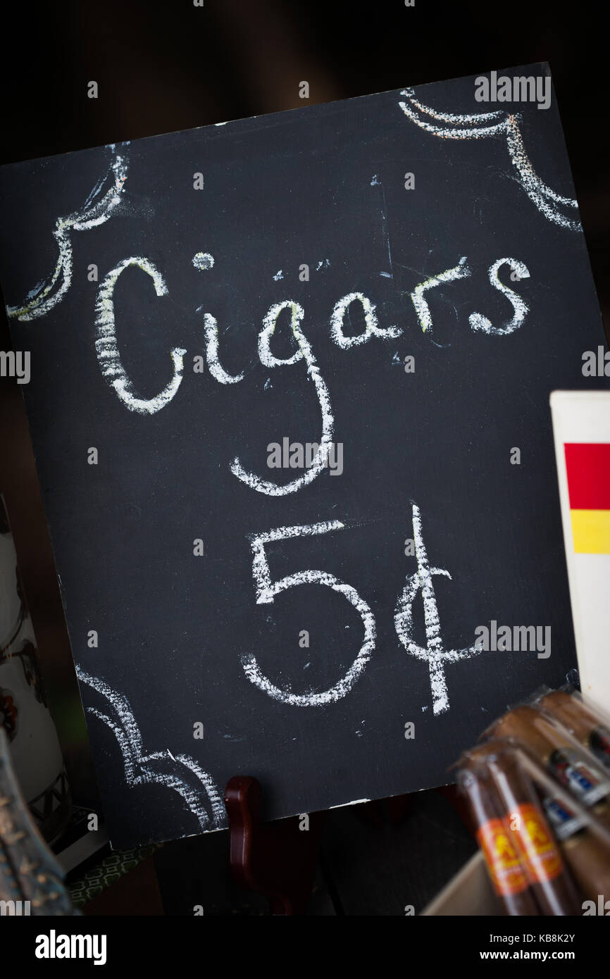 Simple black chalkboard sign offering cigars Stock Photo - Alamy