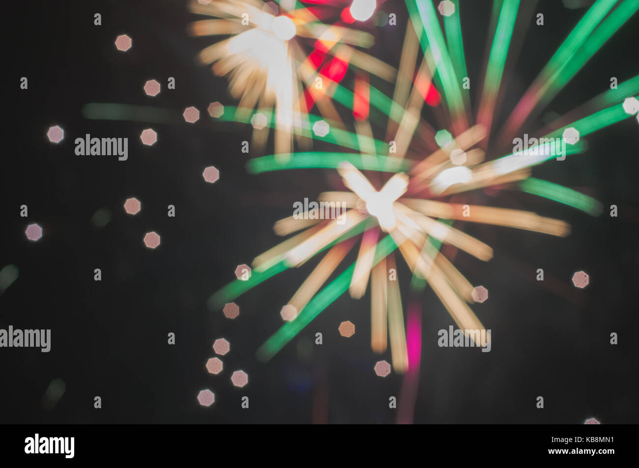 Out of focus firework are being lit in the sky Stock Photo - Alamy