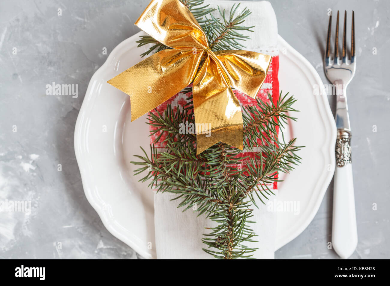 Christmas festive table, New Year's serving of a white plate with a ...