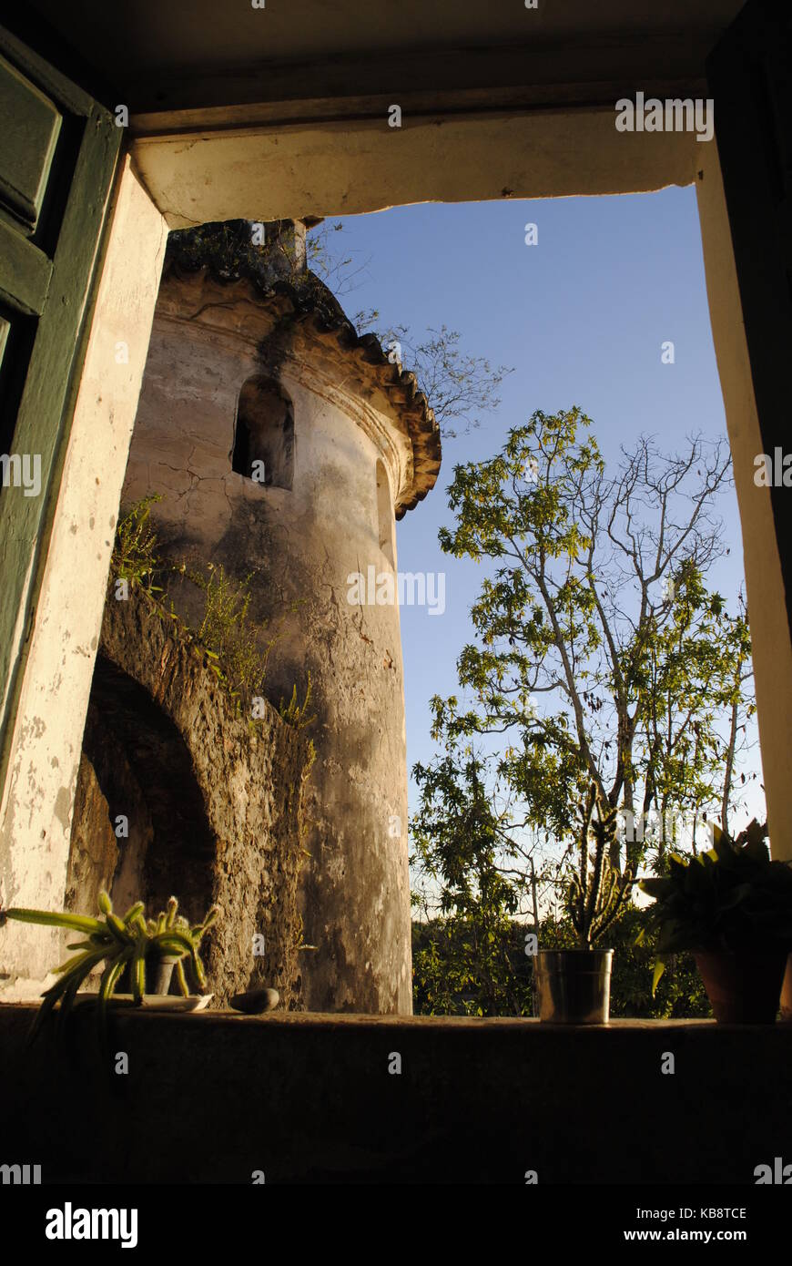 Rustic tower viewed through the canvas formed by a window Stock Photo ...