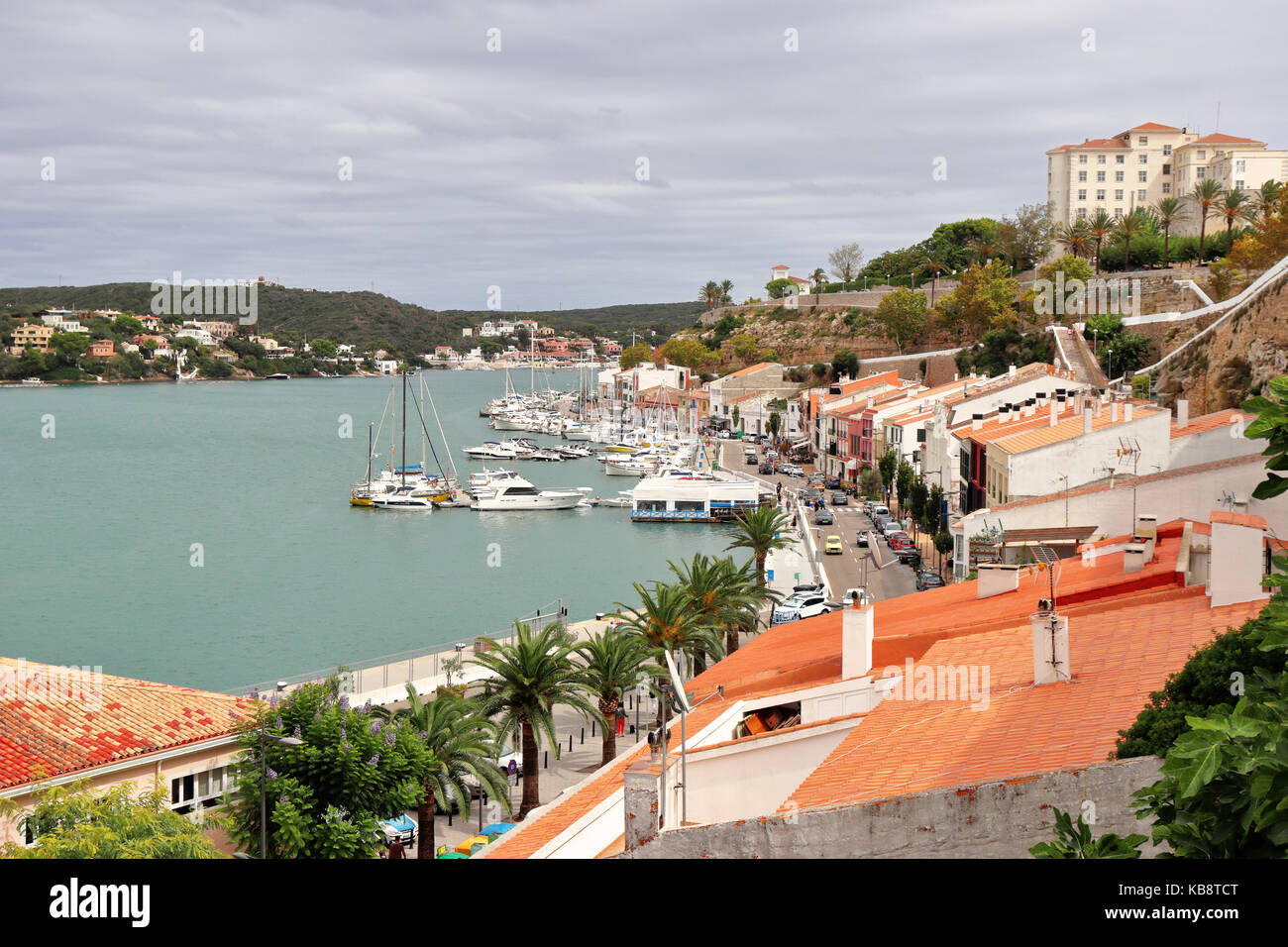 Mahon harbour in Minorca with fishing boats and yachts moored Stock ...