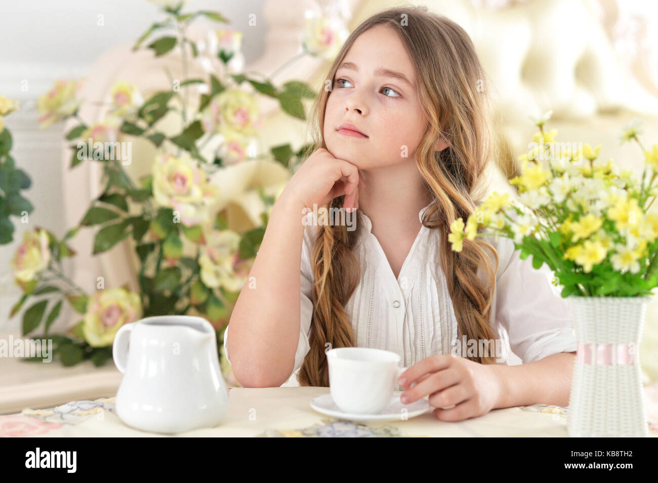 girl drinking tea Stock Photo - Alamy