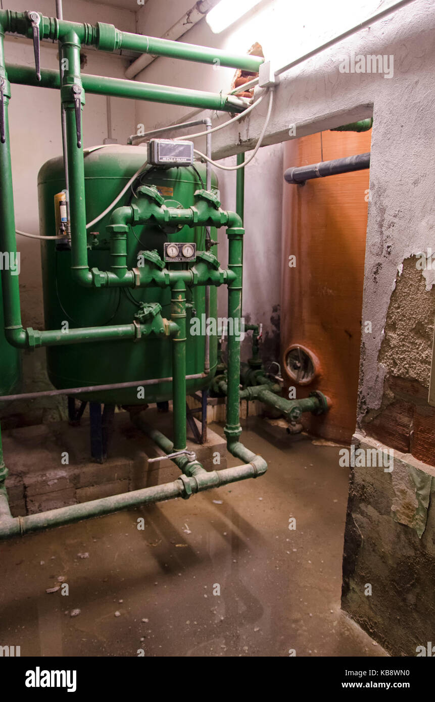 View of an old water storage in a building Stock Photo - Alamy