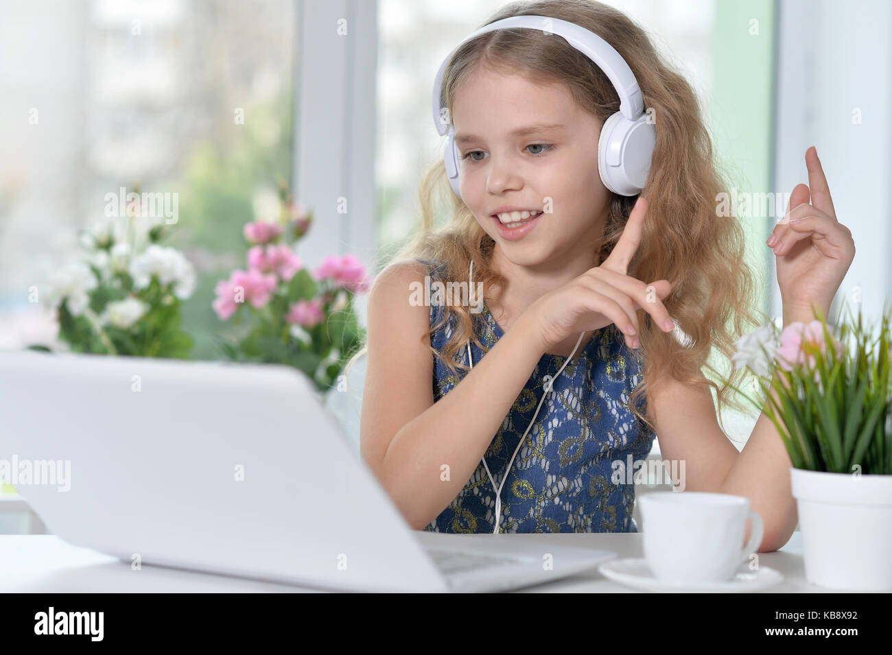 little girl using laptop Stock Photo - Alamy