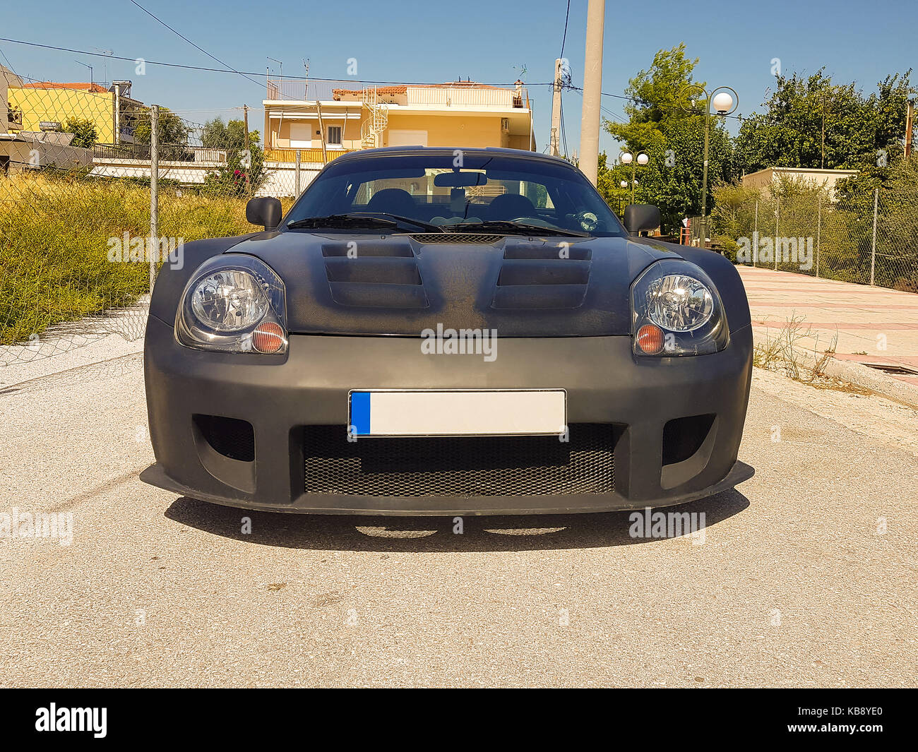 Front of a black sport car Stock Photo - Alamy
