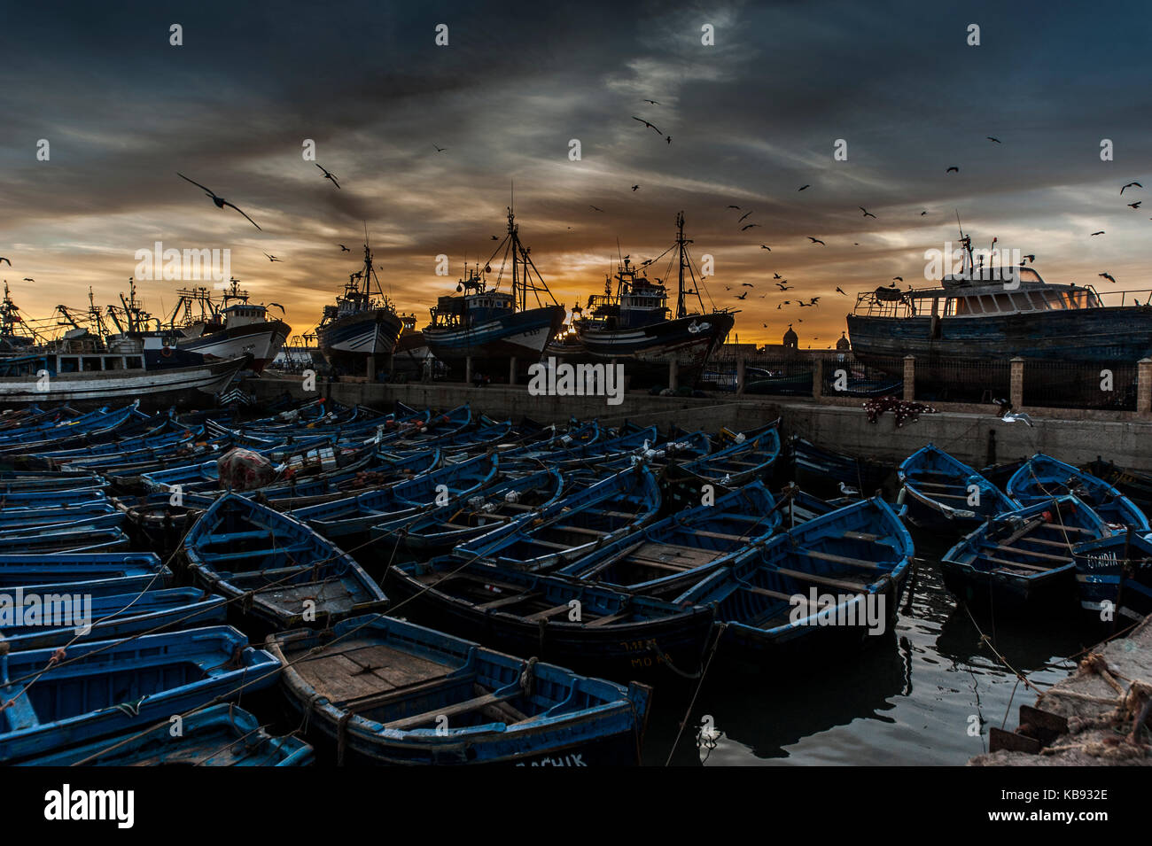 Blue boats in the port of Essaouira, Morocco Stock Photo - Alamy