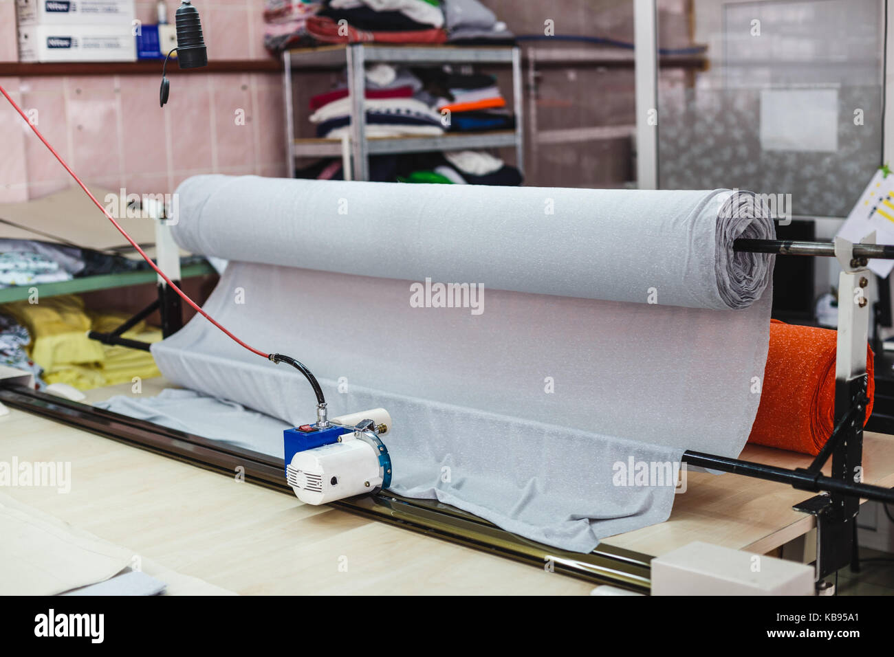 Machine for cutting a large fabrics. Machine cutter cutting cloth Stock ...