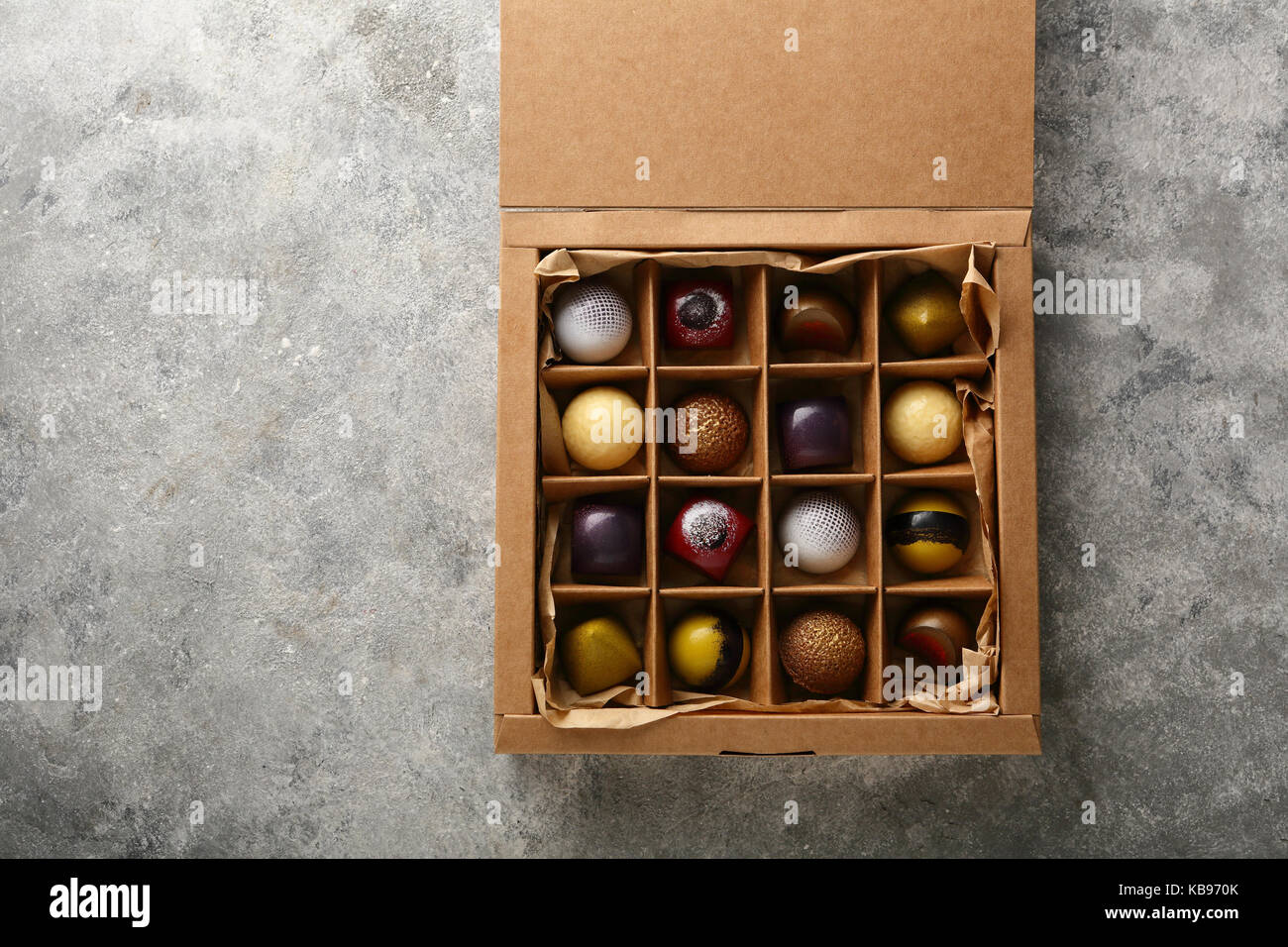 Assortment of candy in gift box, food above Stock Photo - Alamy