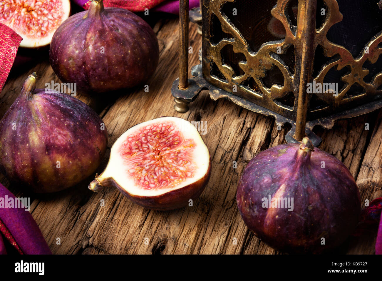 Turkish whole figs and figs, cut in half on a retro background Stock ...