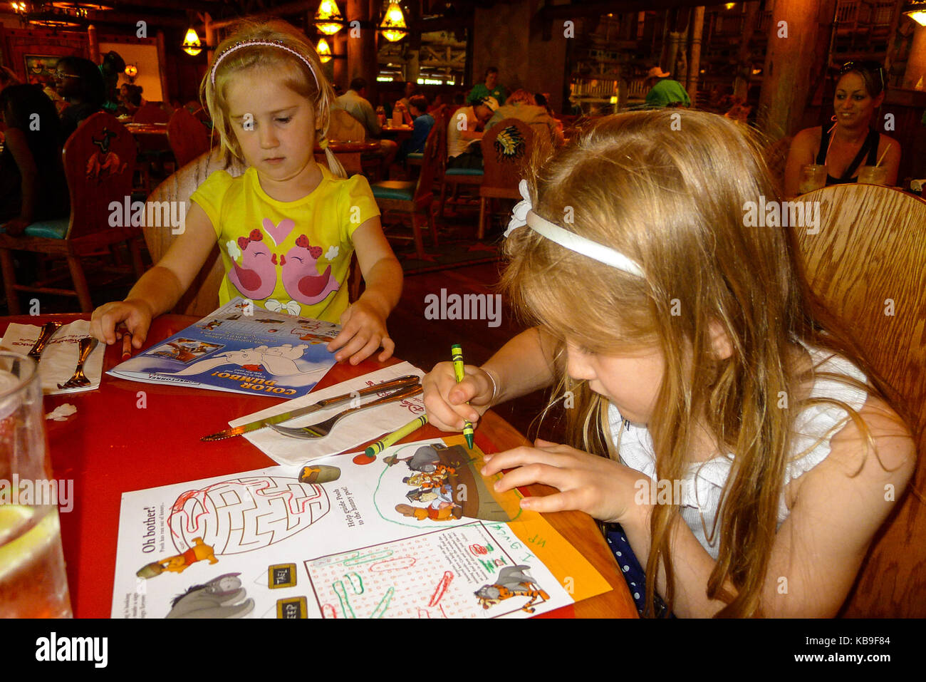 Children colouring in pages in a restaurant Stock Photo - Alamy