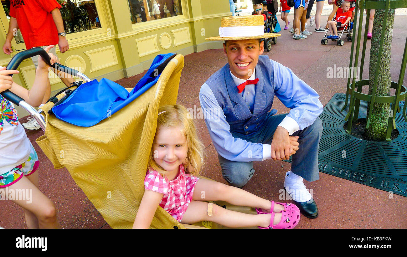 Magic Kingdom dancer greeting a child, Disney World Florida USA Stock ...
